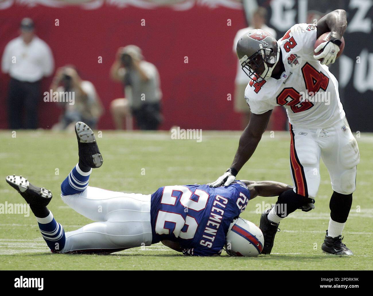 Tampa Bay Buccaneers running back Carnell Williams pushes off Buffalo ...