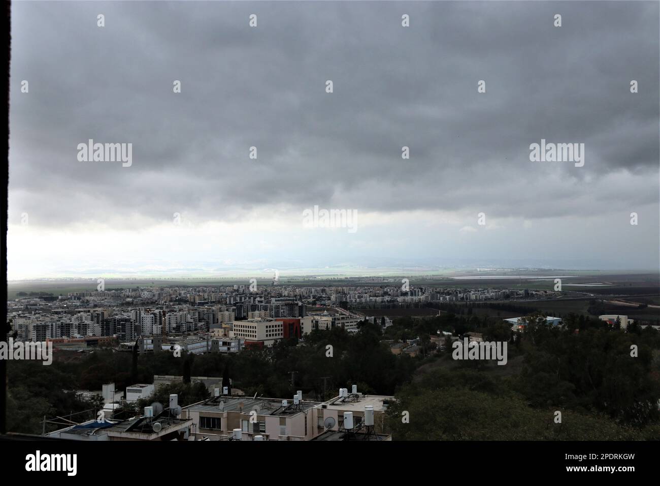 Cloudy sky before a storm over a city Stock Photo - Alamy