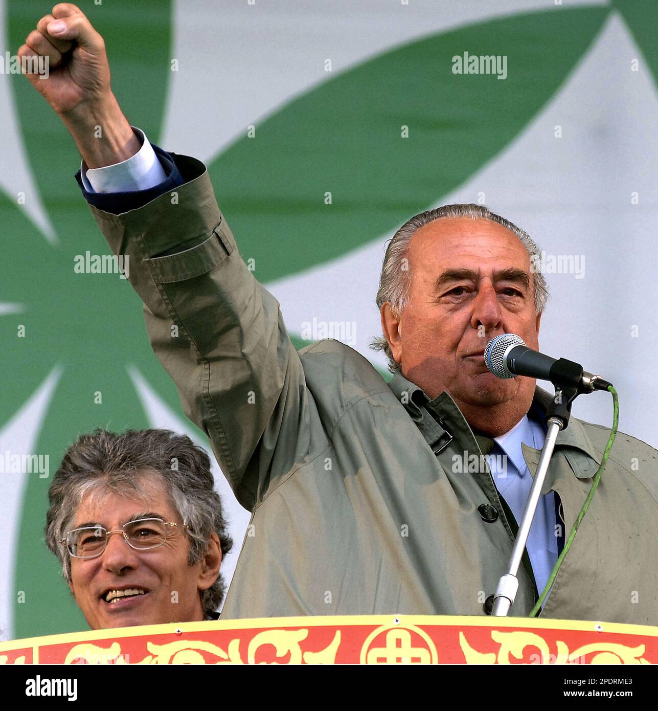 Mayor of Treviso Giancarlo Gentilini, right, delivers his speech as ...
