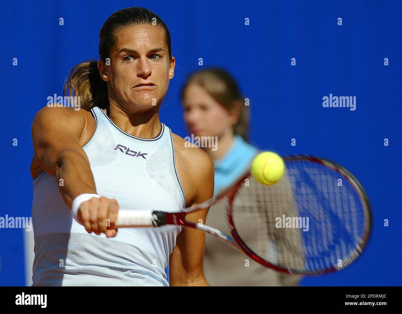 Amelie Mauresmo of France, returns the ball to Elena Dementieva of ...