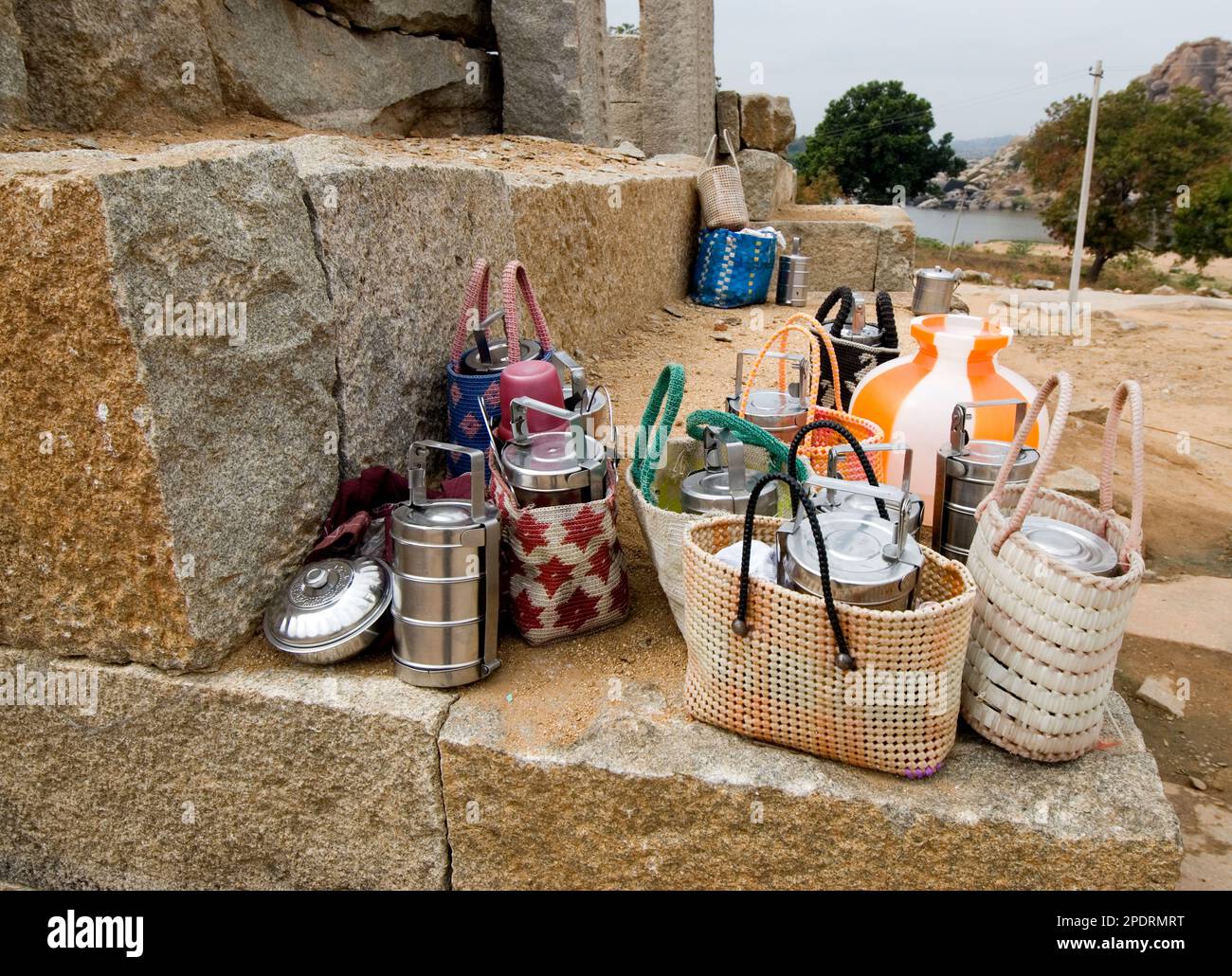 Workers Lunch boxes on rocks at Hampi state Karnataka India Stock Photo ...