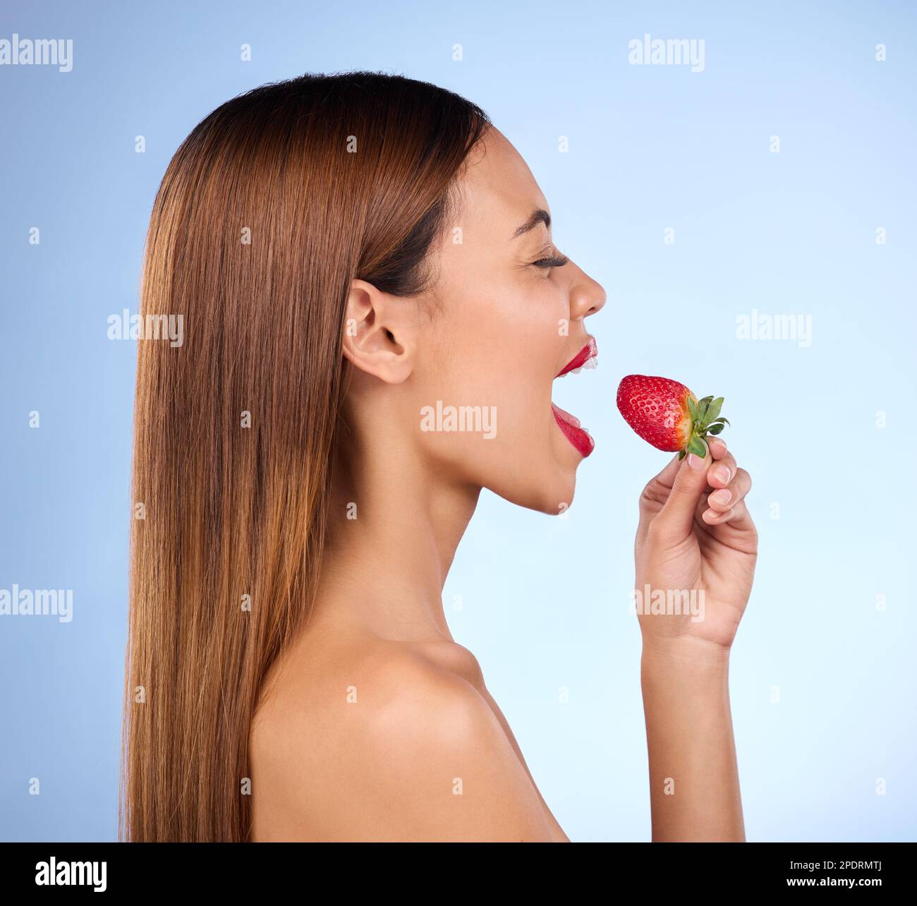 Beauty, wellness and profile of woman with strawberry on blue ...