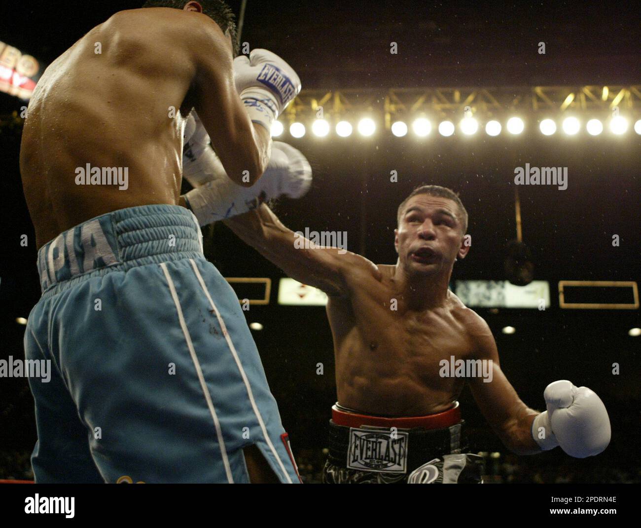 Robbie Peden, right, of Brisbane, Australia, throws a punch at Marco ...