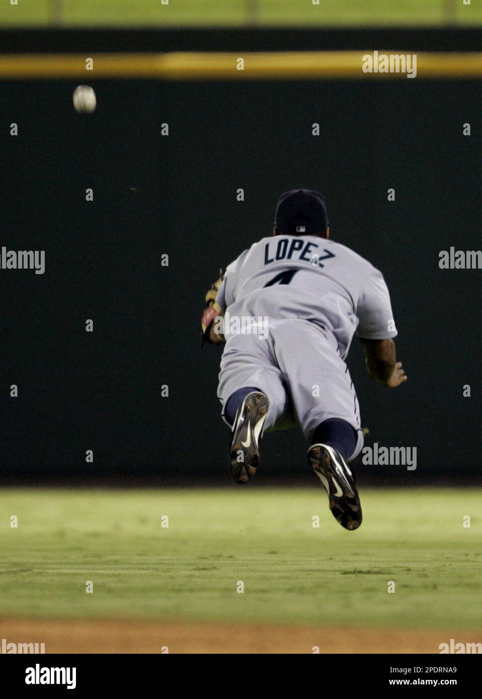 Seattle Mariners second baseman Jose Lopez (4) makes a leaping effort ...