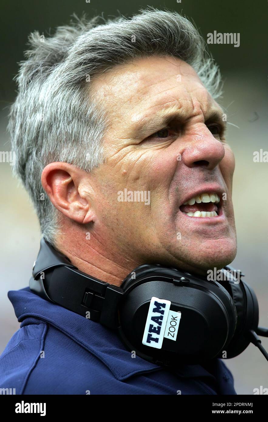 Illinois head coach Ron Zook yells out instructions to his team in the ...