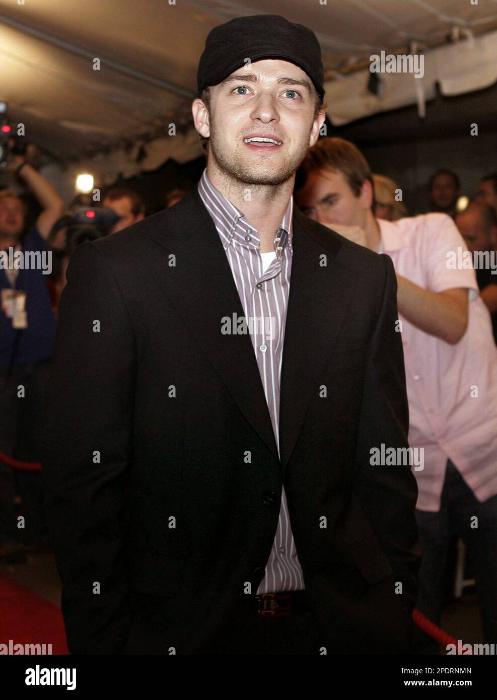 Justin Timberlake smiles as he arrives for the premier of the movie ...