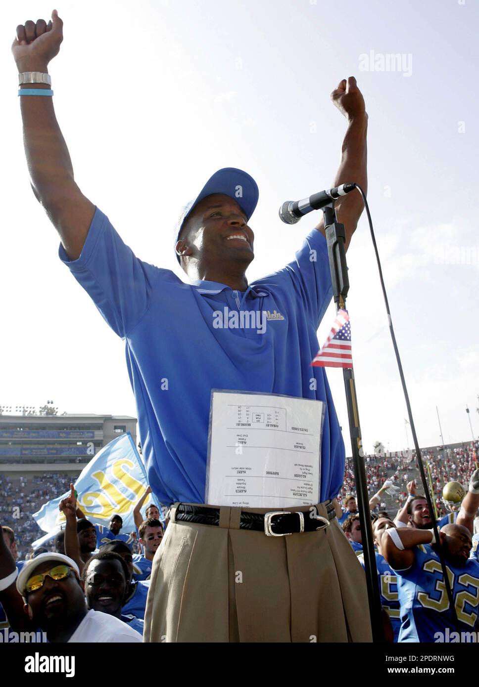 UCLA head coach Karl Dorrell celebrates after UCLA upset No. 21 ...