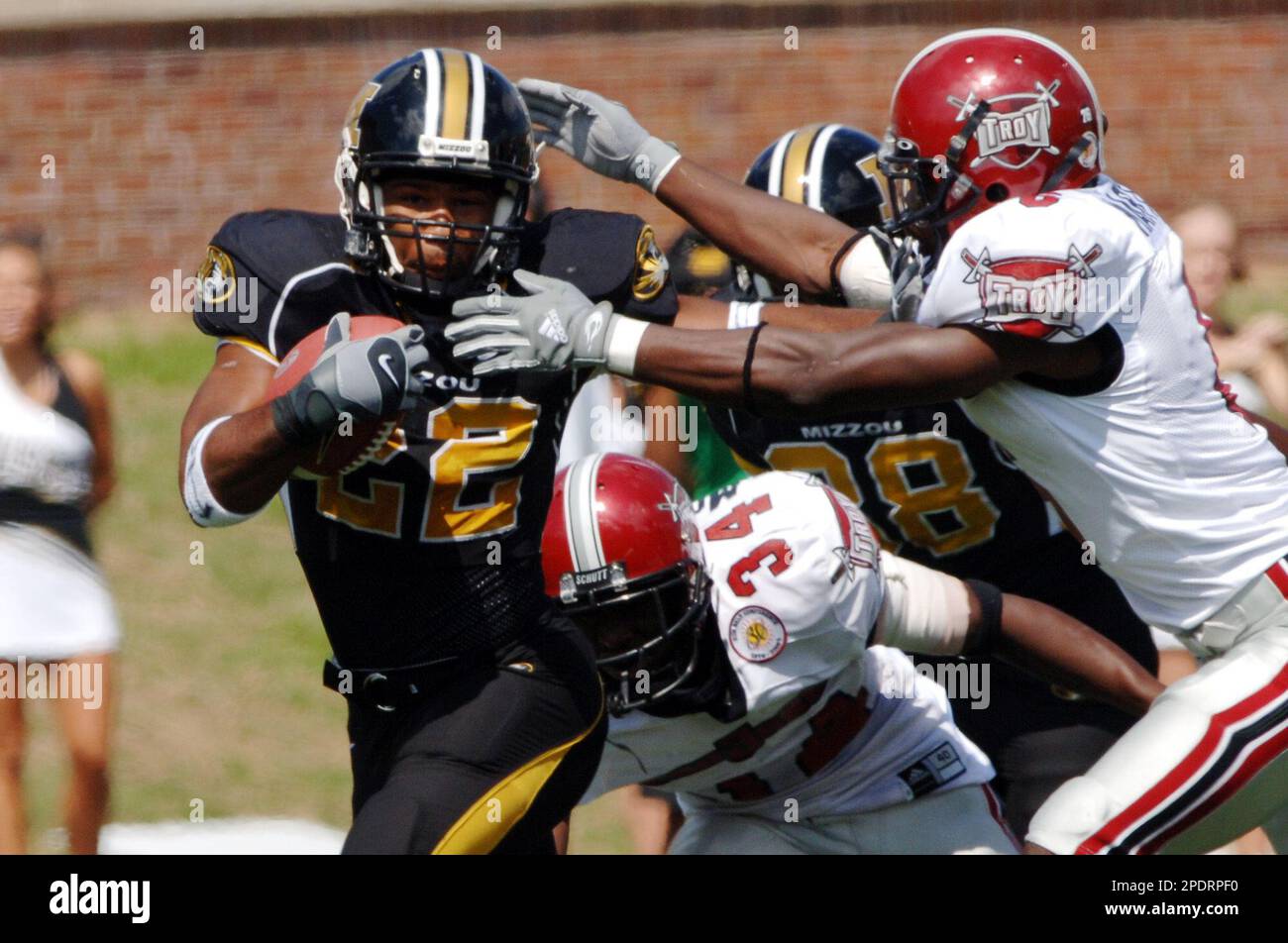 Missouri running back Tony Temple, left, breaks past Troy's Sherrod ...
