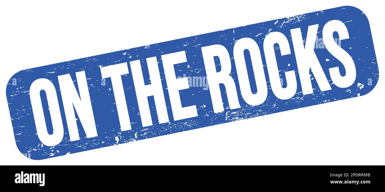 ON THE ROCKS text written on blue grungy stamp sign Stock Photo - Alamy
