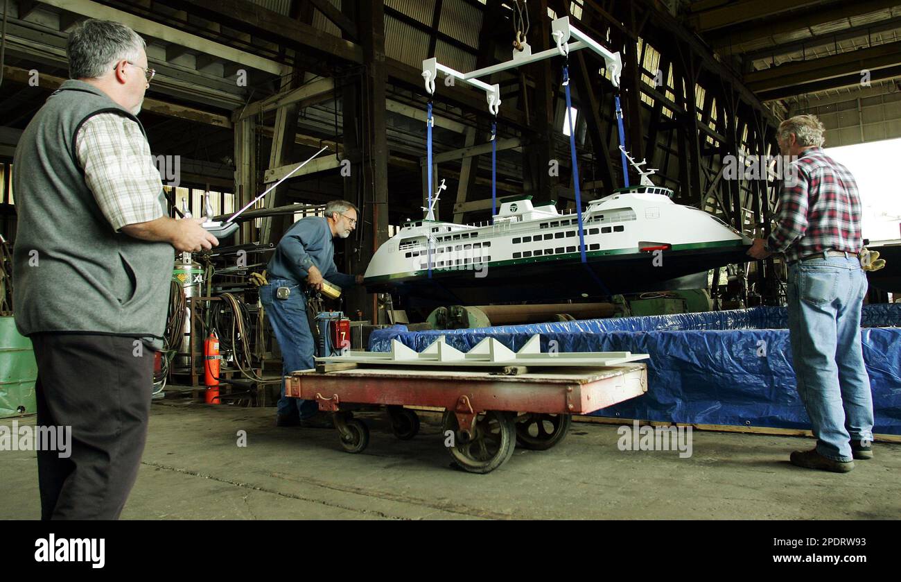 Ron Burchett, left, a marine model-builder, ferry pilot trainer, and ...