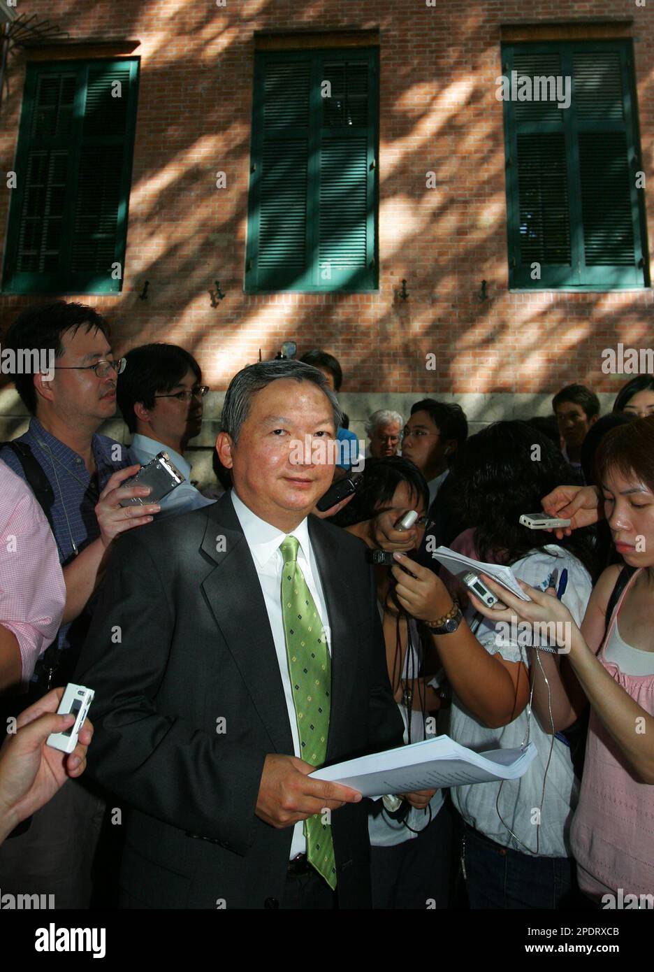 Albert Tsang, center, lawyer of Teddy Wang's father, appears outside the Court of Final Appeal ...