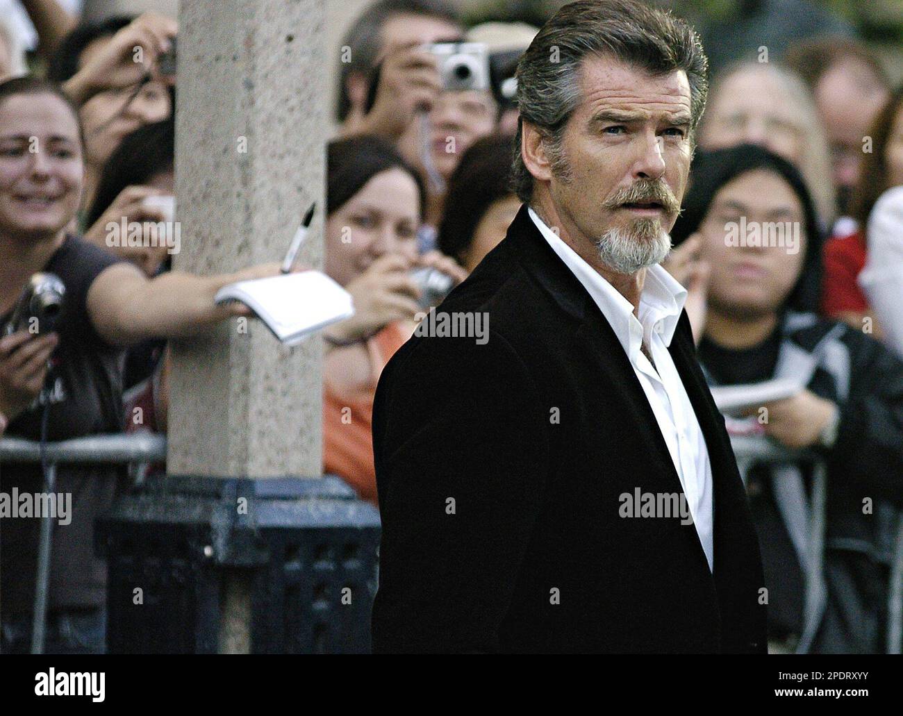 Actor Pierce Brosnan arrives at the gala premiere for the movie "The ...
