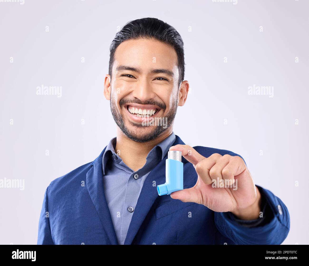 Smiling inhaler holding man pump hi-res stock photography and images ...