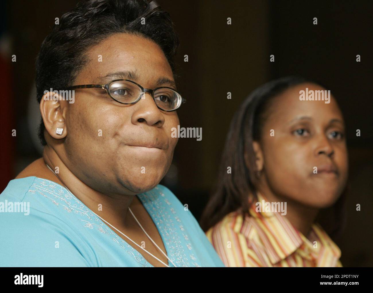 Tamika Craft-Demming, left, and Stacy Newton, cousins of Adrian Newton ...