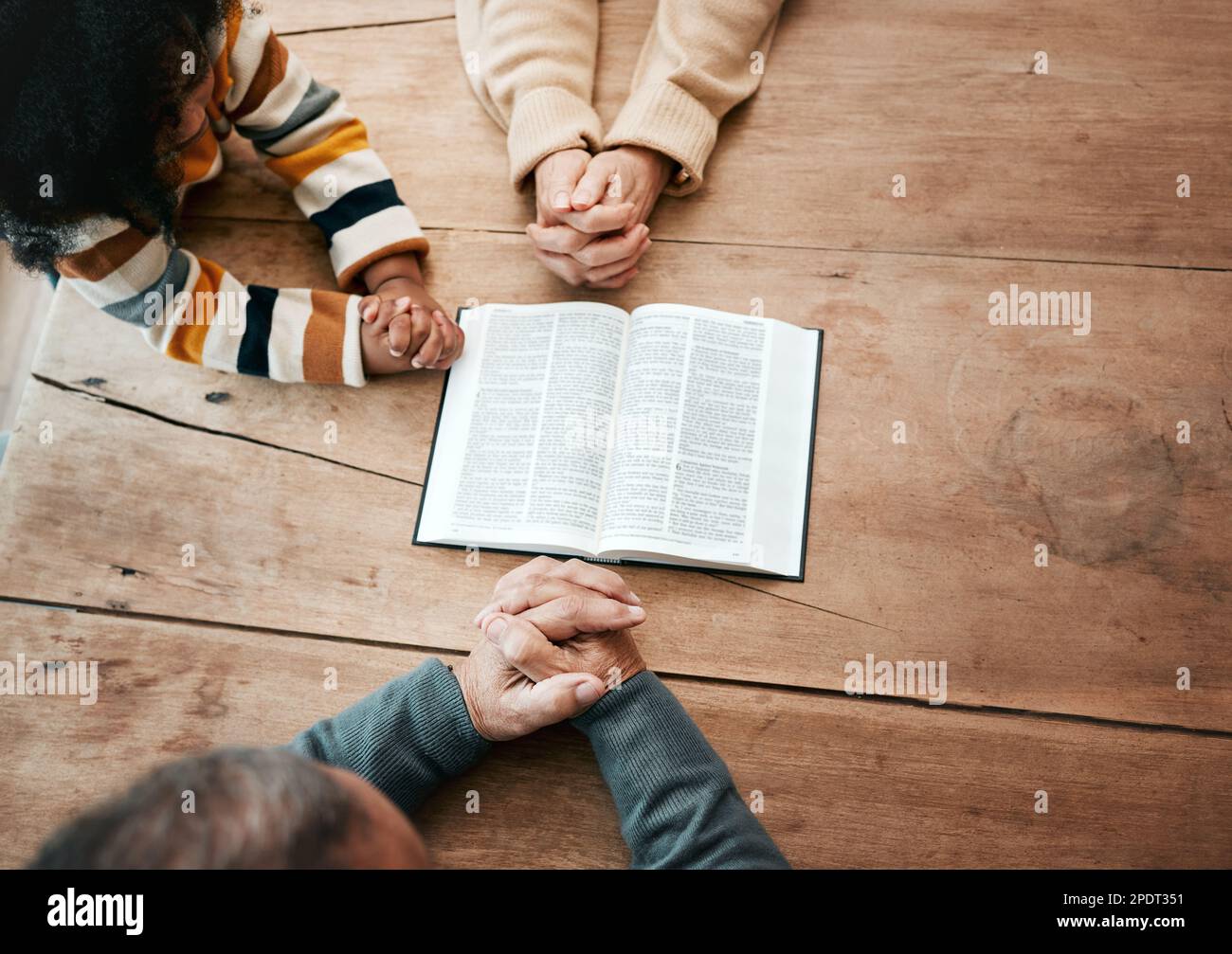 Bible, reading book or hands of grandma with children for worship ...
