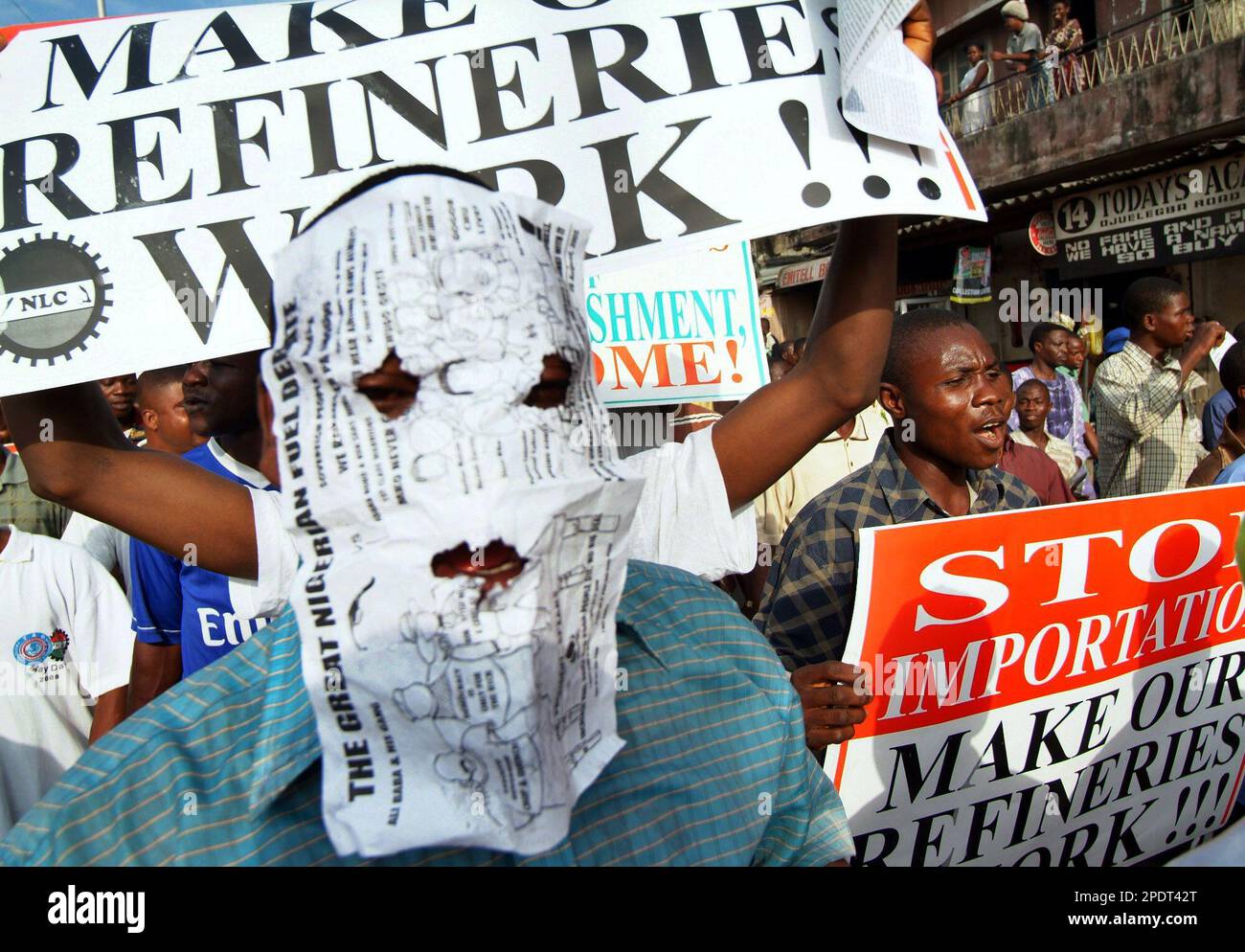 Protesters march through a major street in Lagos, Nigeria, Wednesday ...