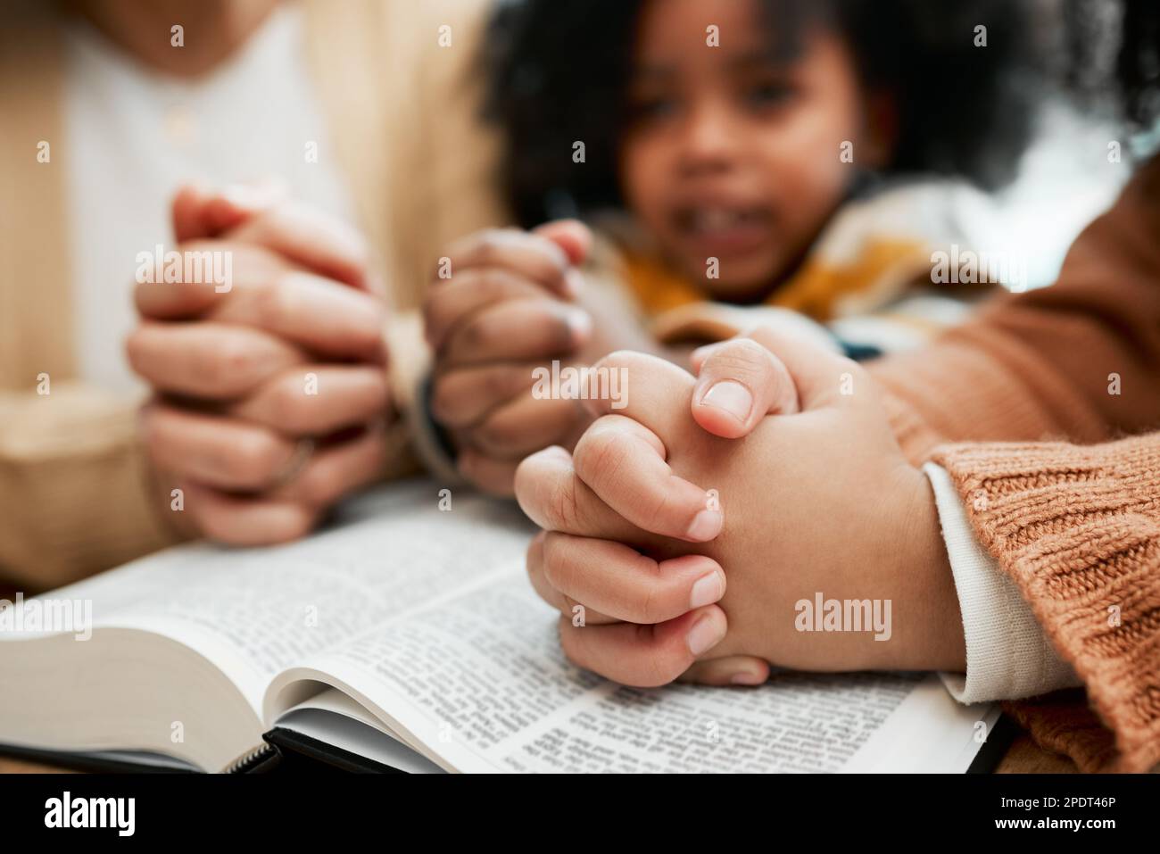 Bible, hands or mother praying with kid siblings for prayer, support or ...