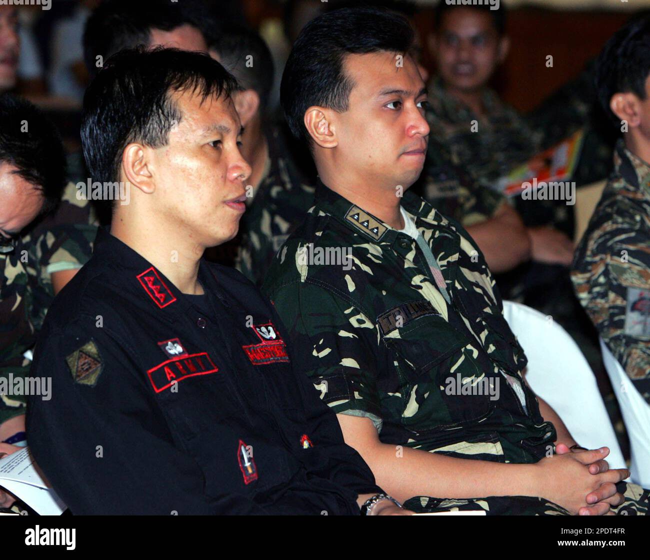 Philippine Army Captain Milo Maestrocampo, left, and Philippine Navy ...
