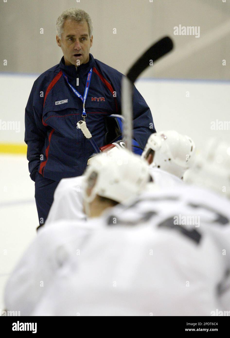 New York Rangers head coach Tom Renney speaks to his team during the ...