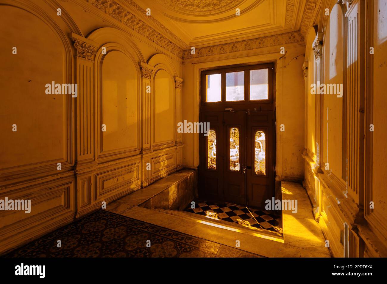Entrance hall in old mansion at night Stock Photo - Alamy