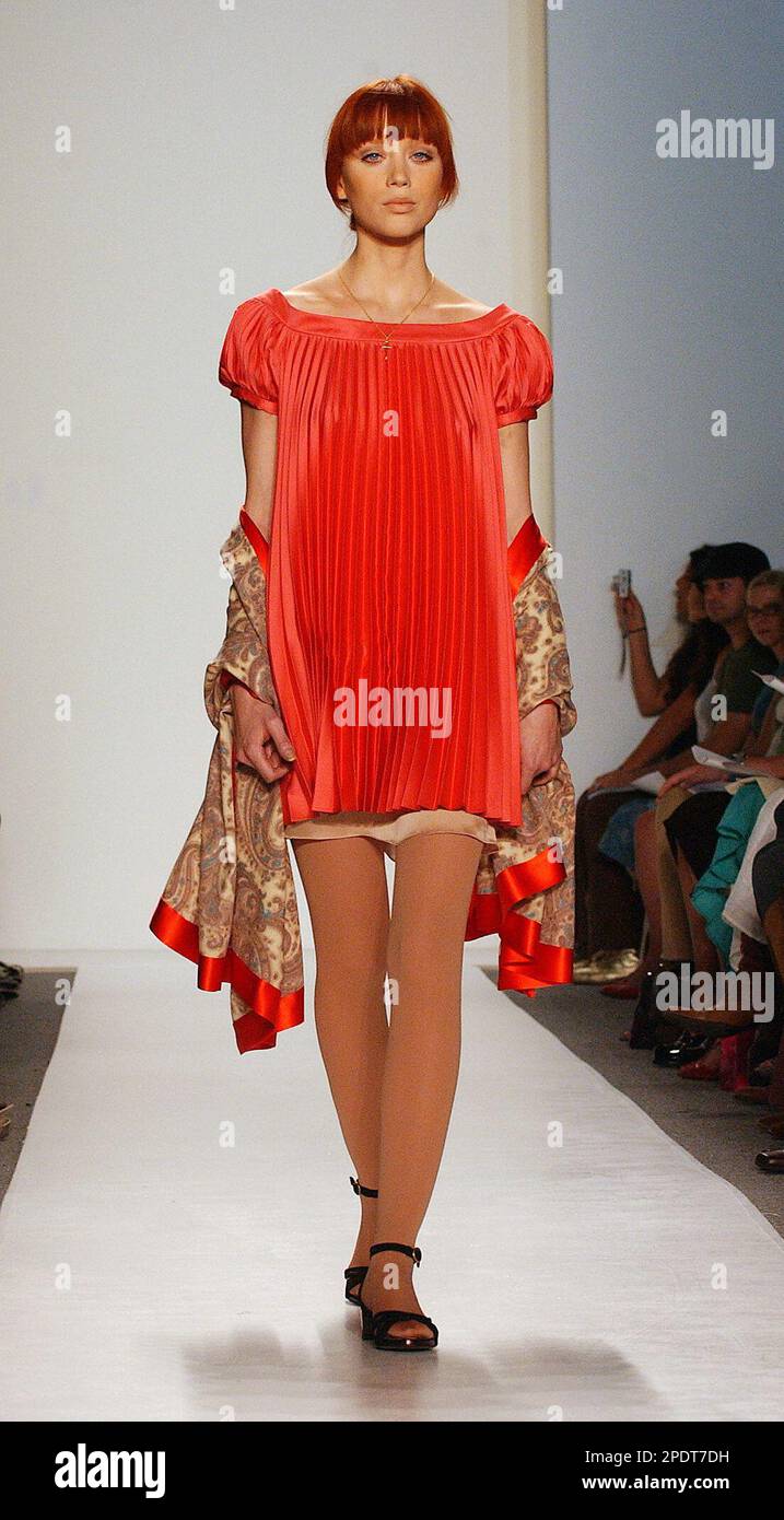 A model wears a hot pink motel love dress with a challis rouge blanket ...