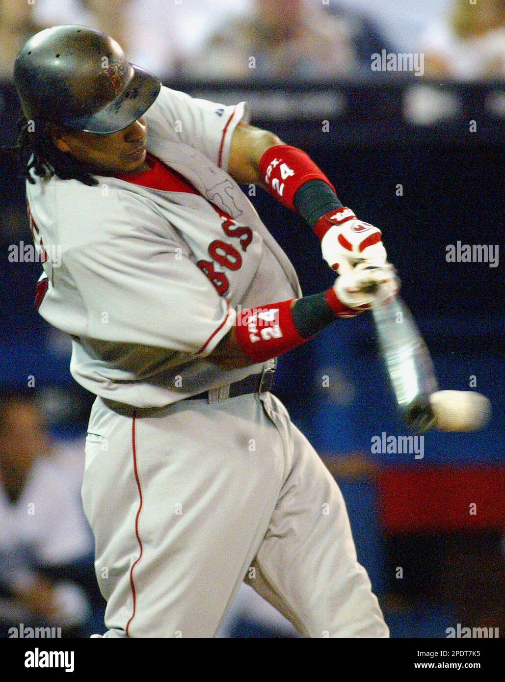 Boston Red Sox's Manny Ramirez hits a single off Toronto Blue Jays ...