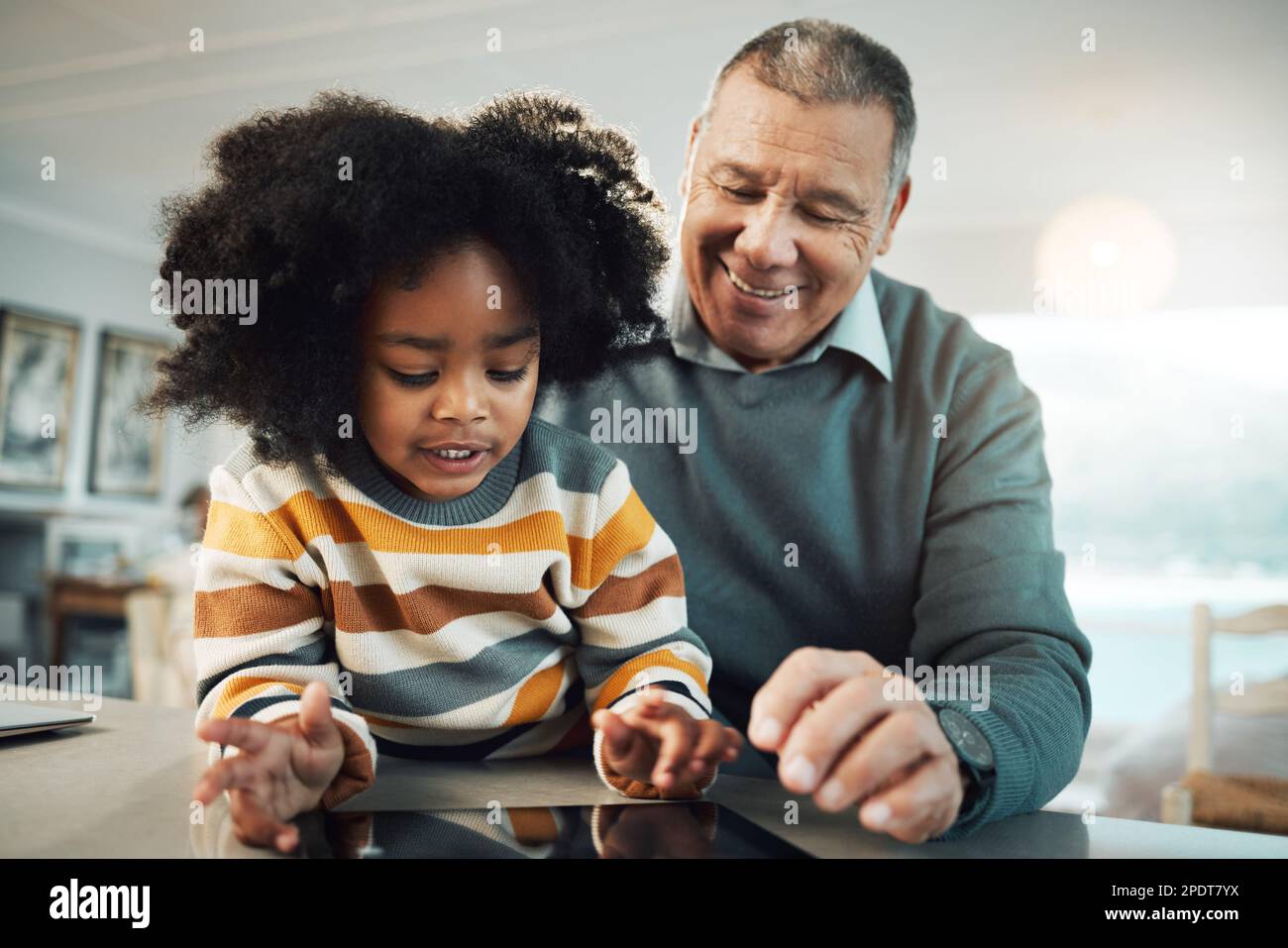 Education, home school and grandfather helping child with reading for ...