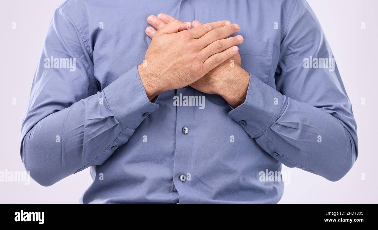 Closeup, hands on chest and man in studio with self love, hope and love ...
