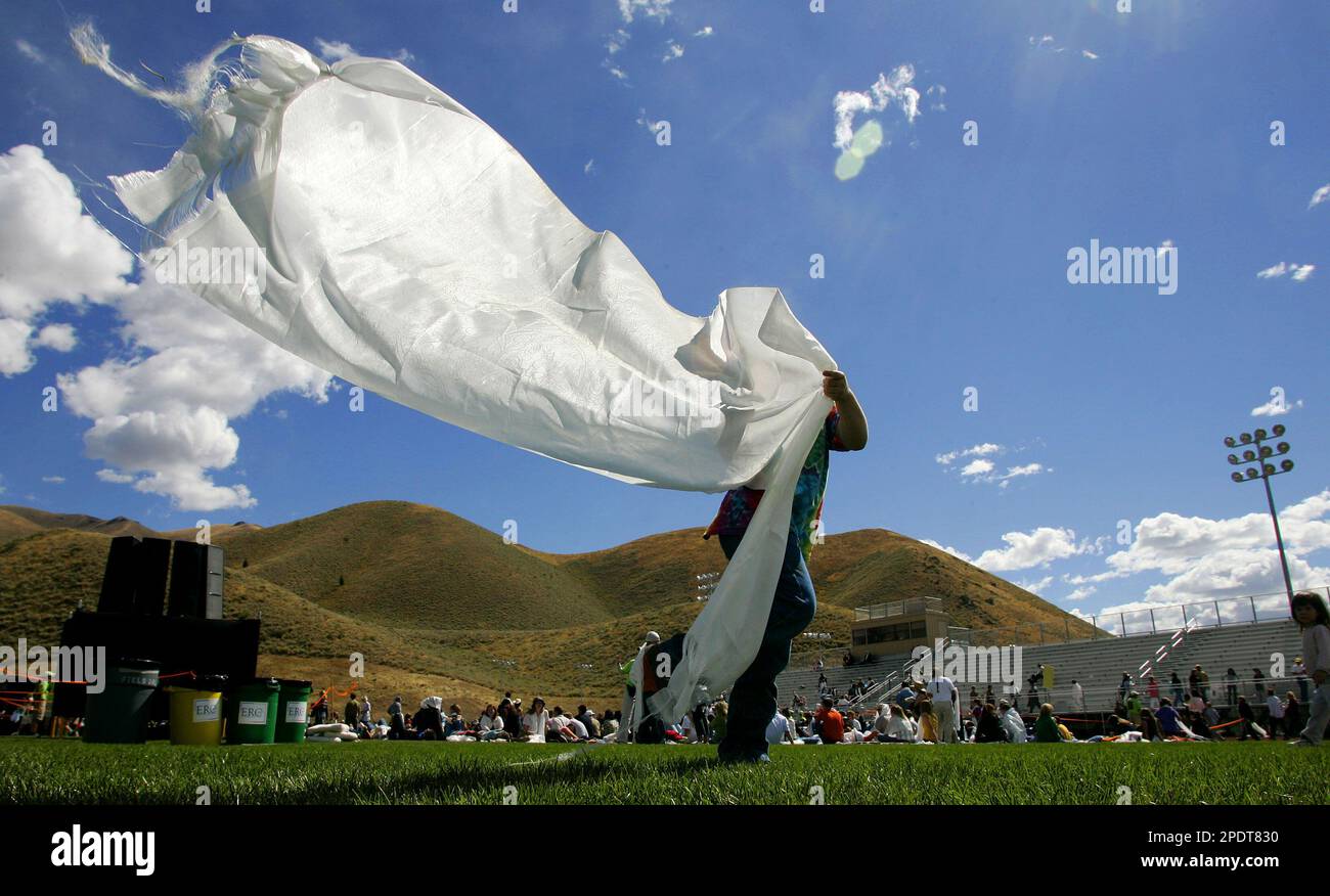 Hailey Foote, 5, runs with a greeting scarf in the wind Monday, Sept ...