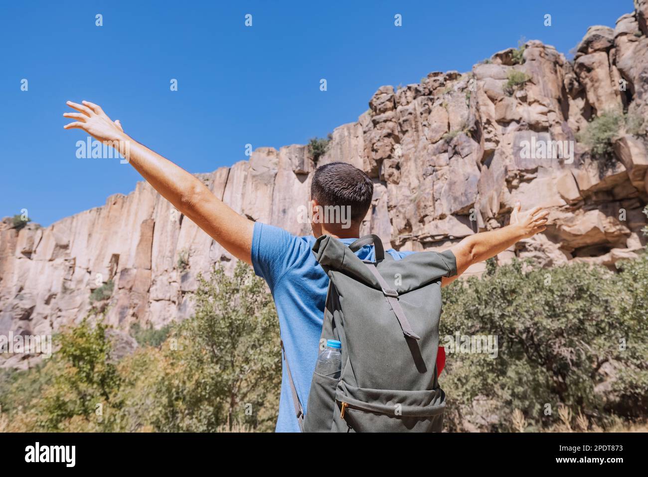 Male hiker with backpack in Ihlara valley, Cappadocia. Travel ...