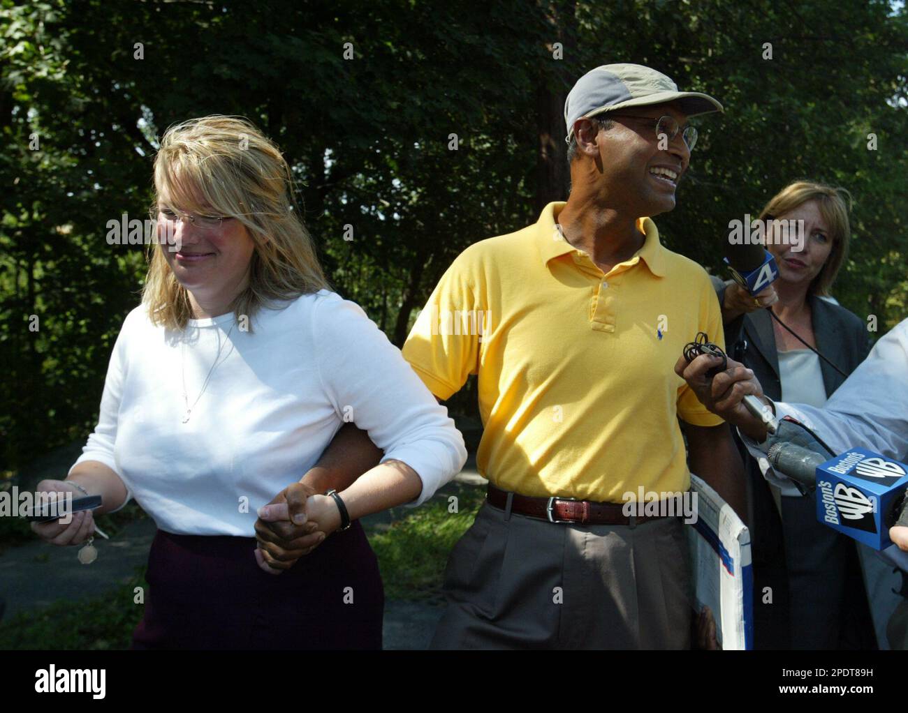 Sandra Rahman and her husband Habib Rahman of Weston, Mass., smile ...