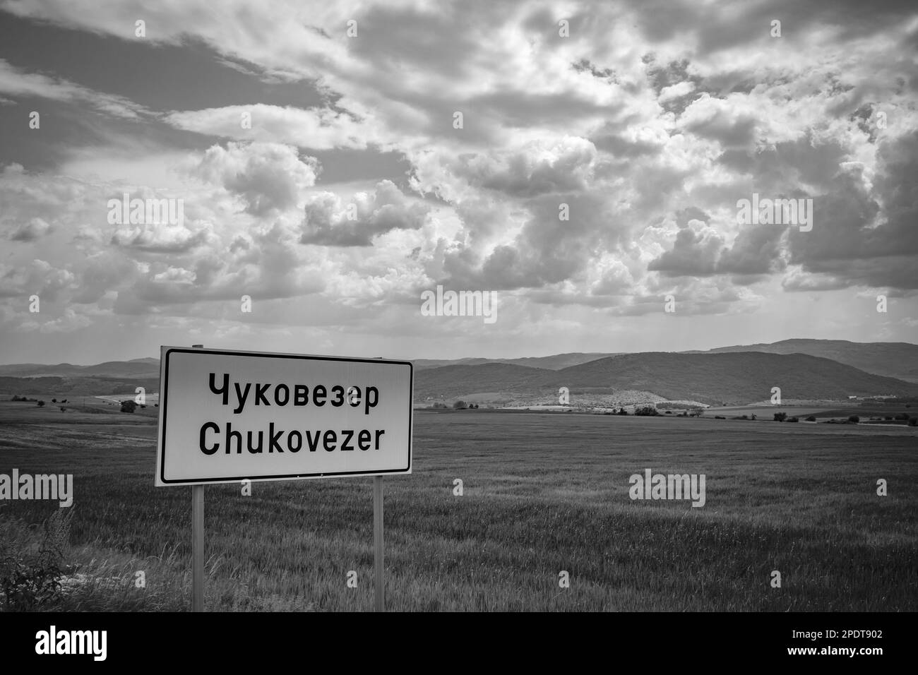 Village road sign near end of the road. Scenery sky in background ...
