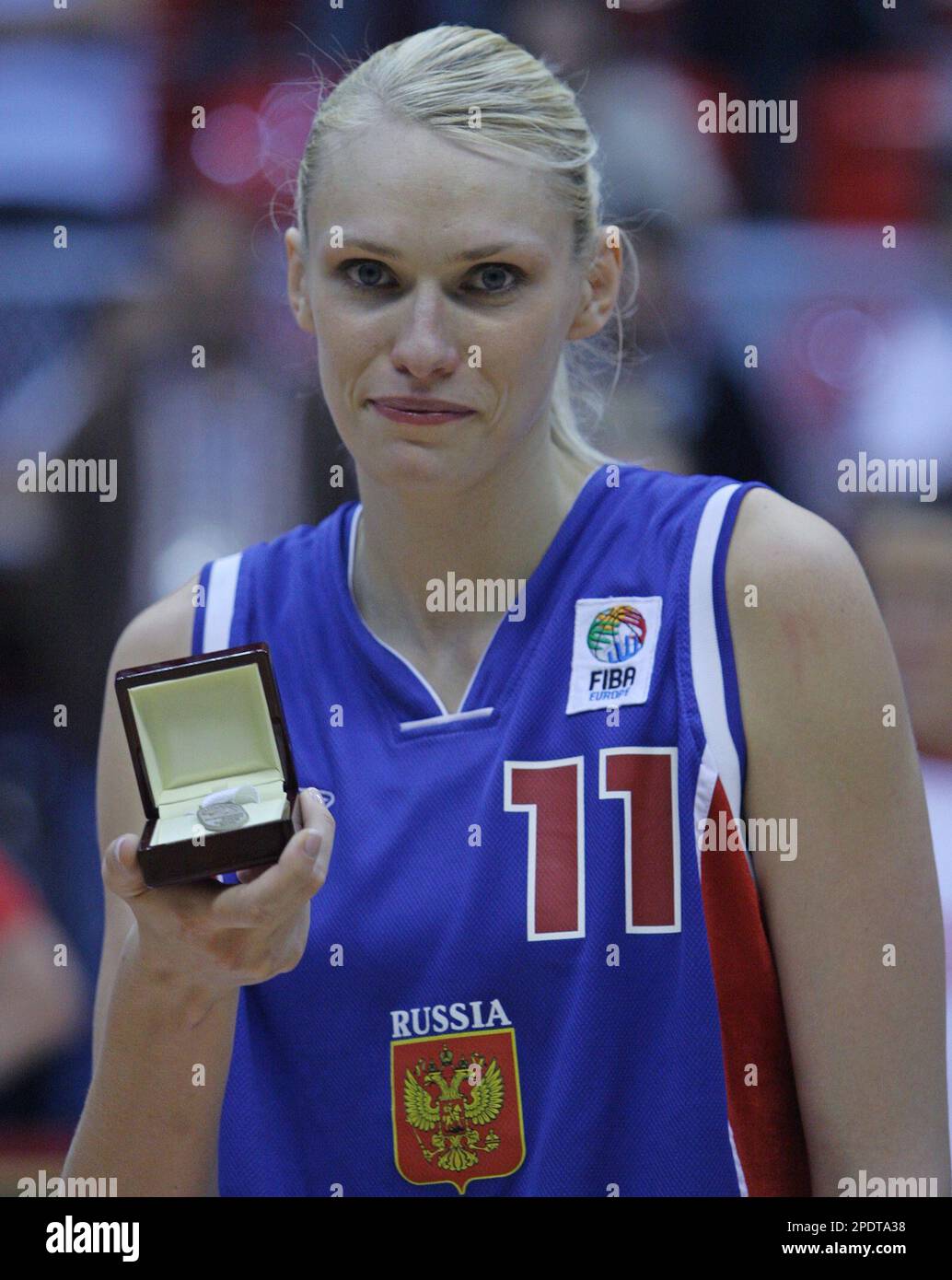 Russia's Maria Stepanova shows her medal for the Most Valuable Player ...