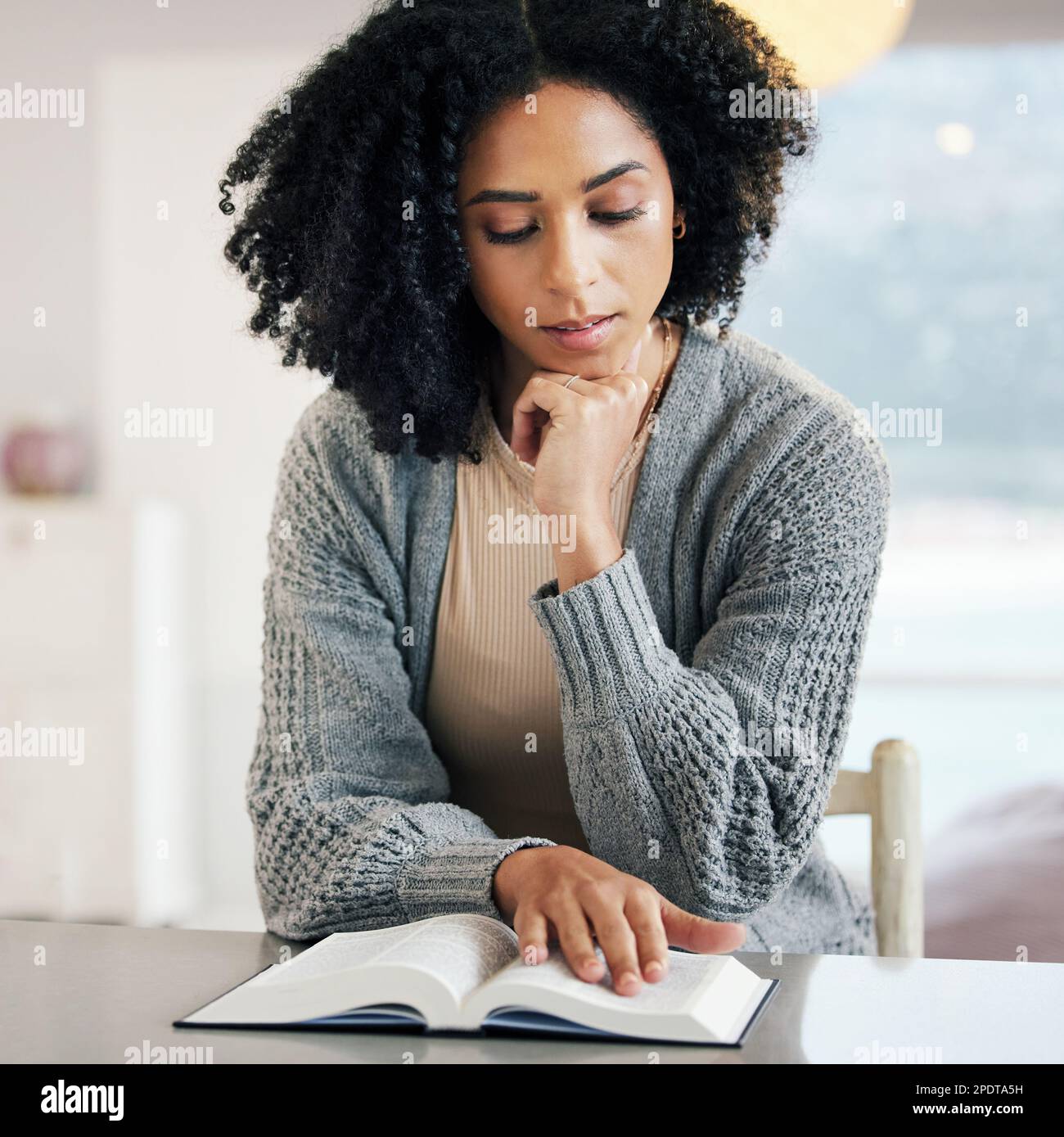 Girl reading holy bible home hi-res stock photography and images - Alamy