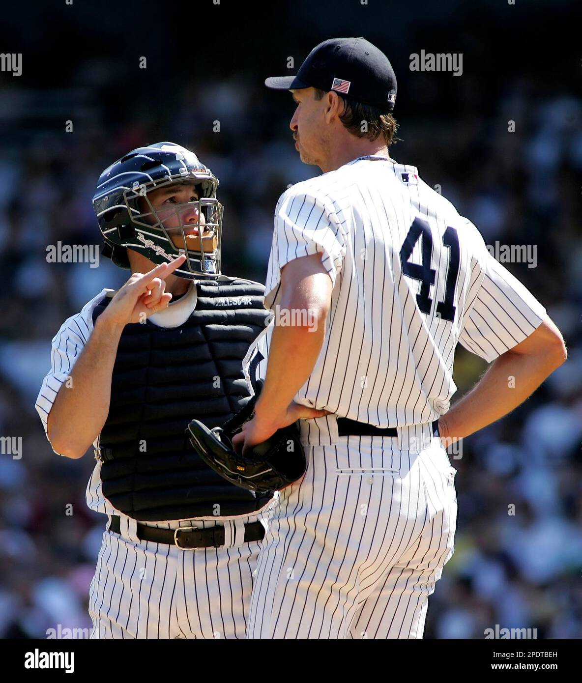 New York Yankees catcher John Flaherty, left, talks with pitcher Randy ...