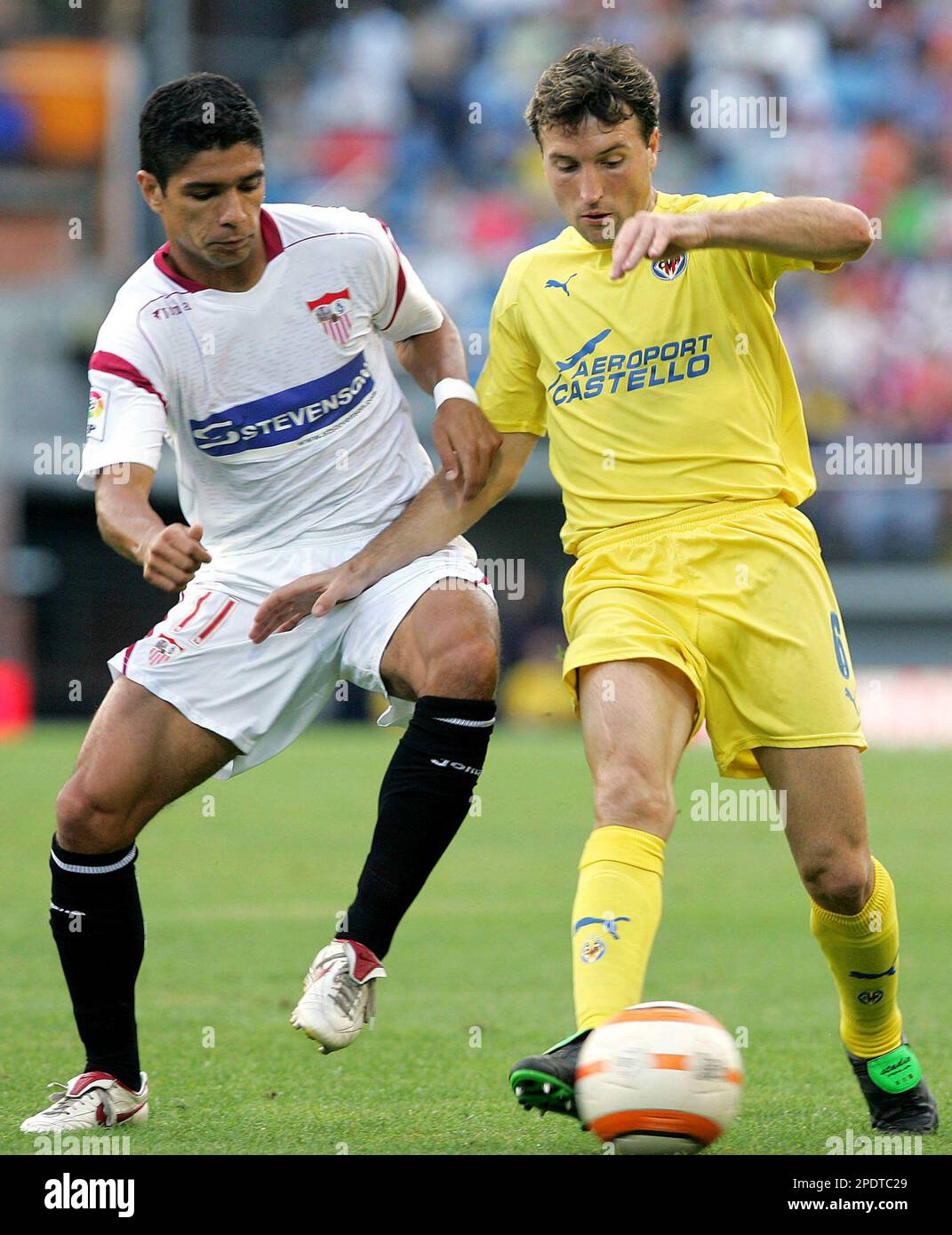 Villarreal's Josico, right, and Sevilla's Dirnei Florencia Renato, from ...