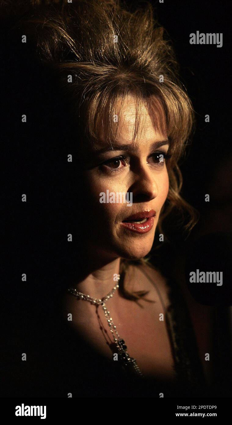 Helena Bonham Carter talks with media as she arrives at the screening ...