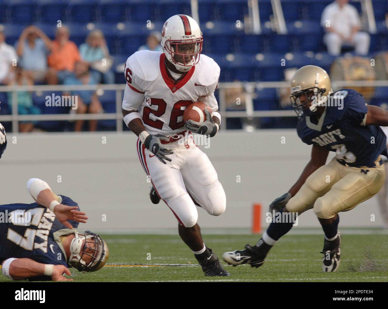 Stanford running back Anthony Kimble runs with the ball against Navy ...