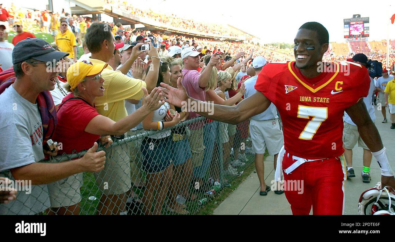 Iowa State quarterback Bret Meyer is congratulated by fans after their ...
