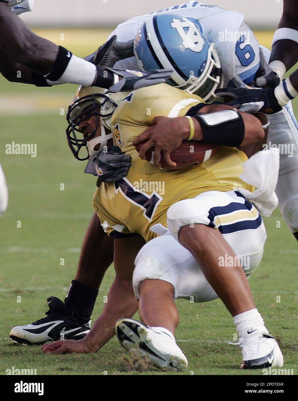 Georgia Tech quarterback Reggie Ball (1) backs in against North ...