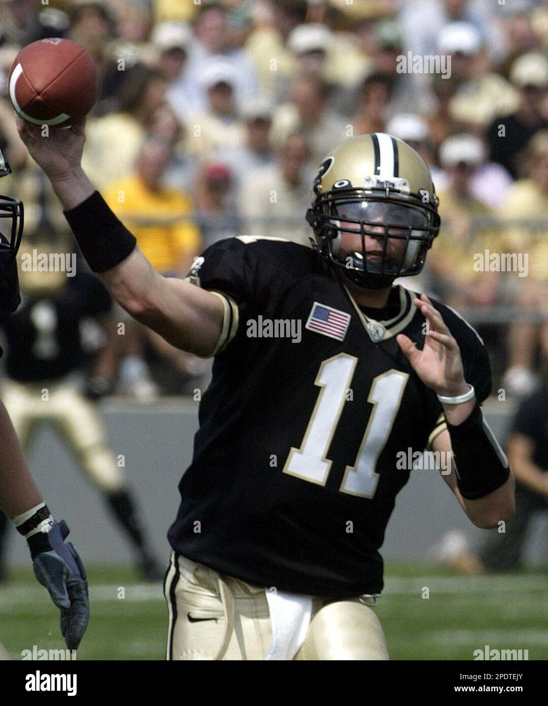 Purdue quarterback Brandon Kirsch lets go of a pass against Akron ...