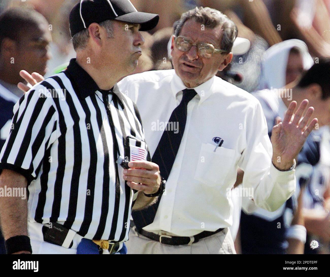 Penn State coach Joe Paterno talks an official during Saturday's 42-24 ...