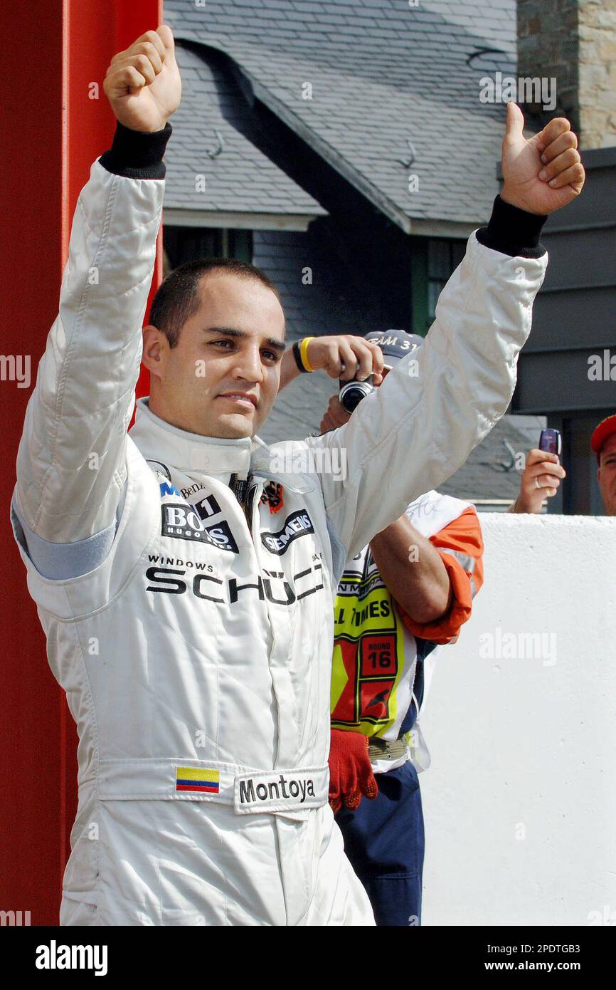 Colombia's Juan Pablo Montoya of the McLaren team shows thumbs up after ...
