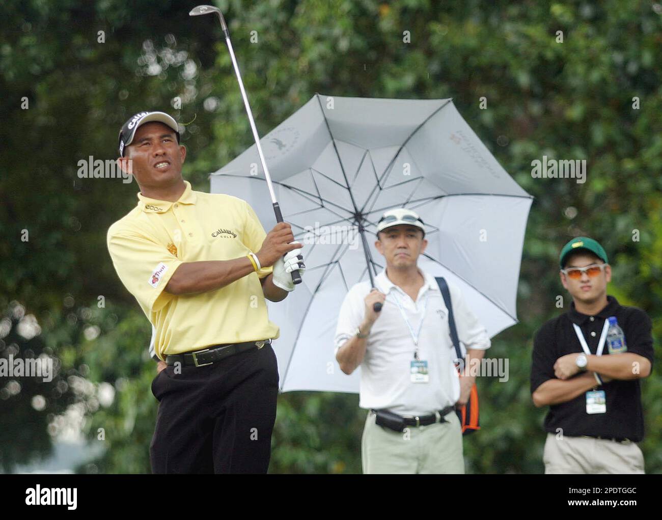 Thai pre-tournament favorite Thongchai Jaidee hits the ball off the ...