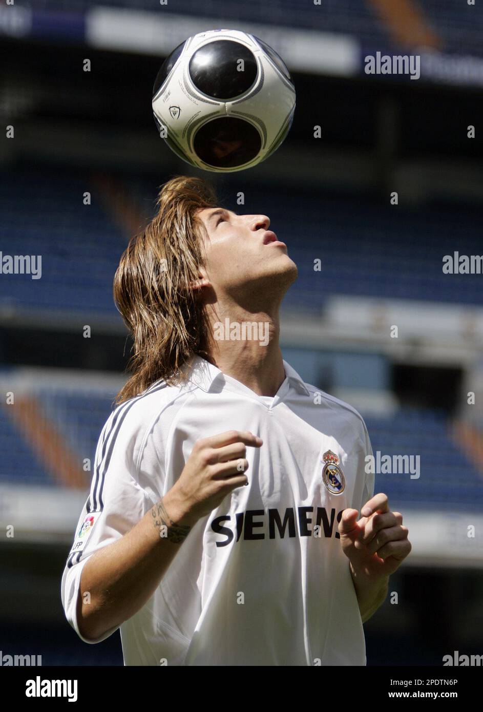 Real Madrid's new defender Sergio Ramos heads the ball during the ...