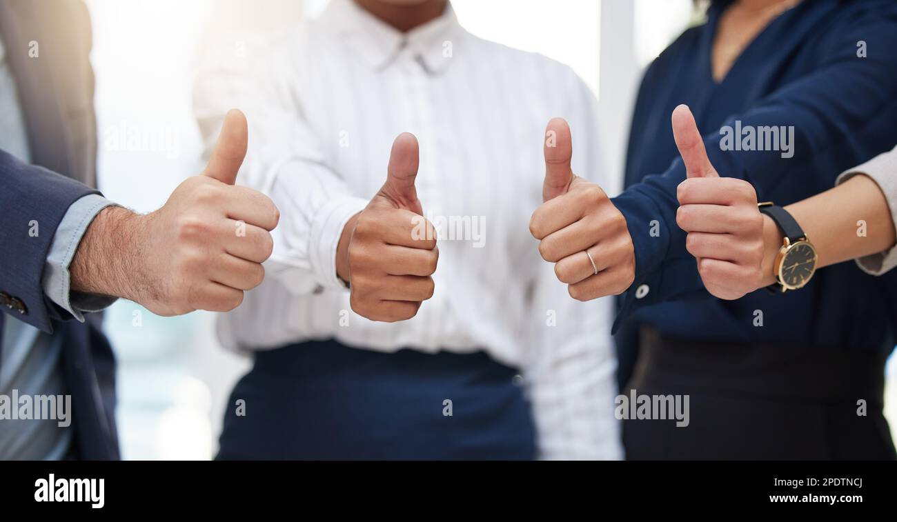 Hands, closeup and business people with thumbs up in office for thank ...