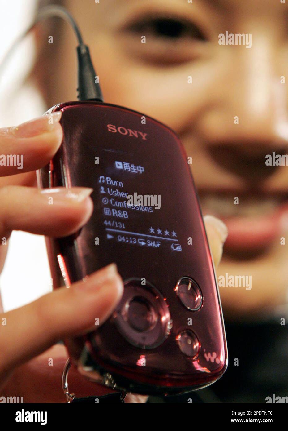 A model displays Sony Corp.'s new Walkman in Tokyo Thursday, Sept. 8 ...