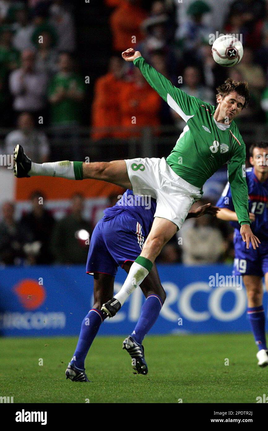 Republic of Ireland's Kevin Kilbane wins a high ball against France ...
