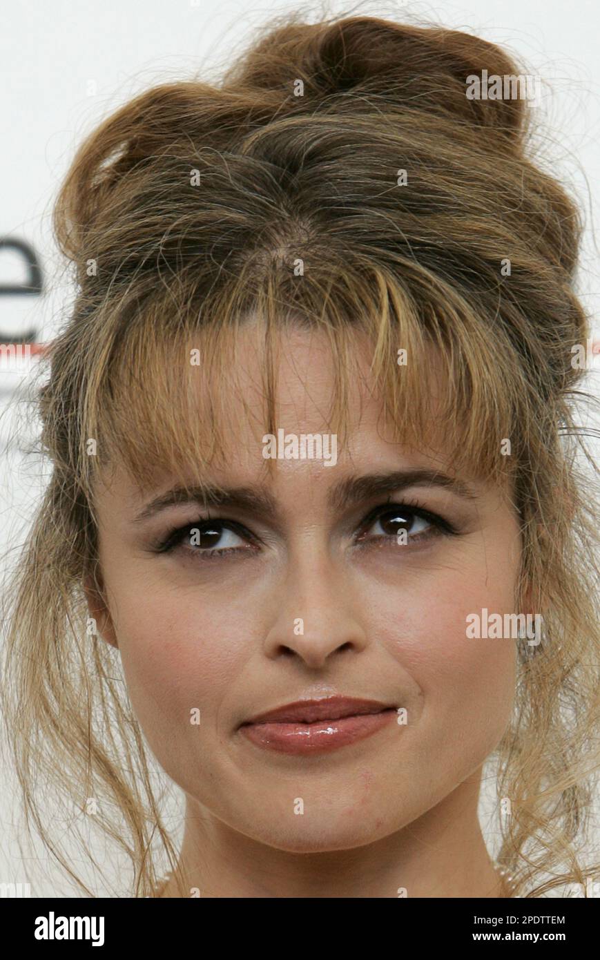 Actress Helena Bonham Carter poses for photographers after a press ...