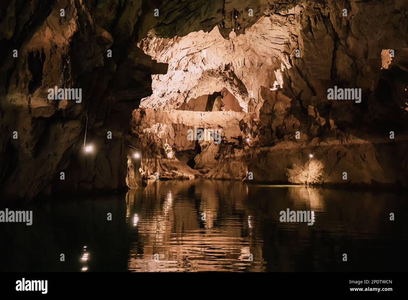 Scenic lake in dark cave. Speleology and travel concept Stock Photo - Alamy